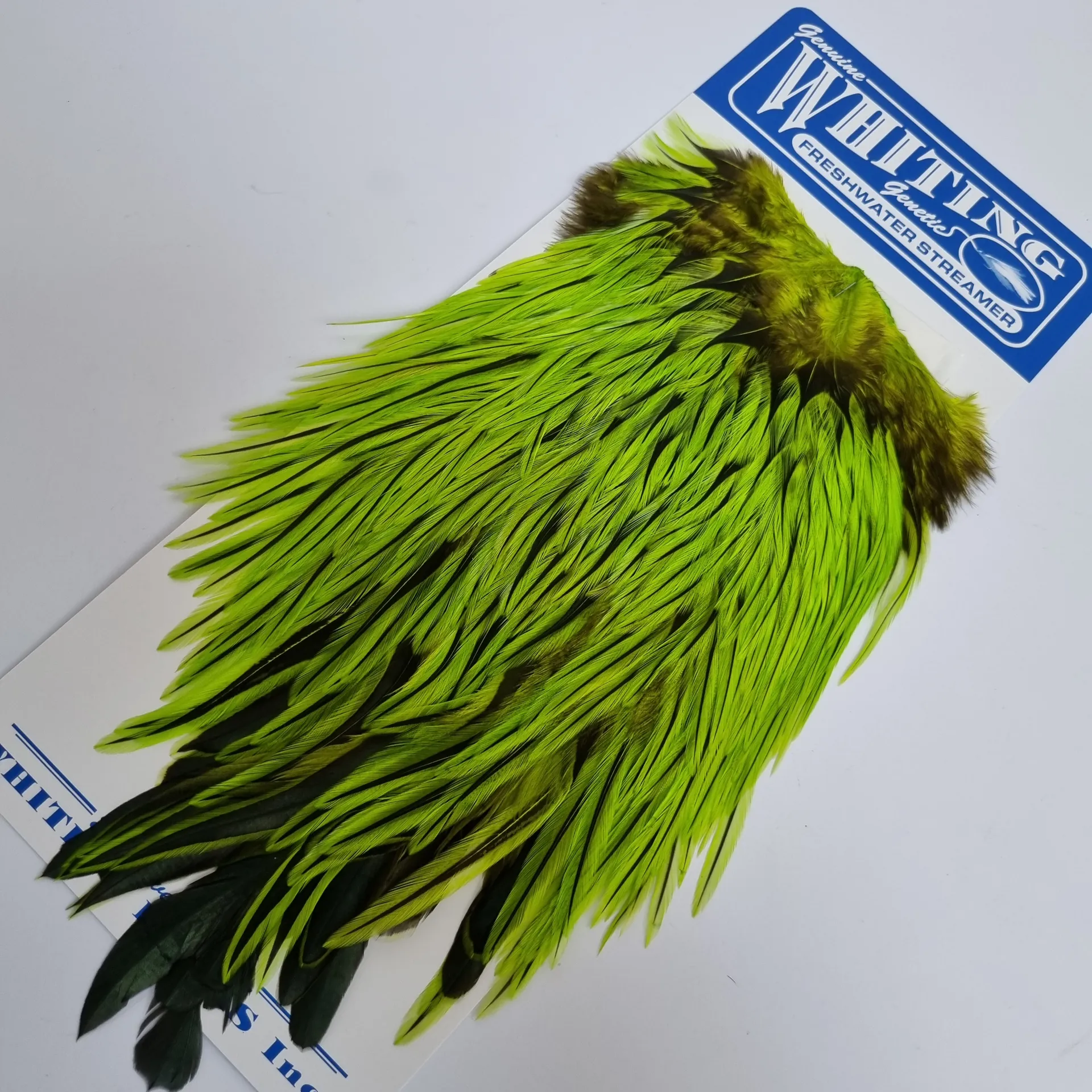 Whiting Freshwater Streamer Rooster Saddle in Silver Badger Dyed Fl ...