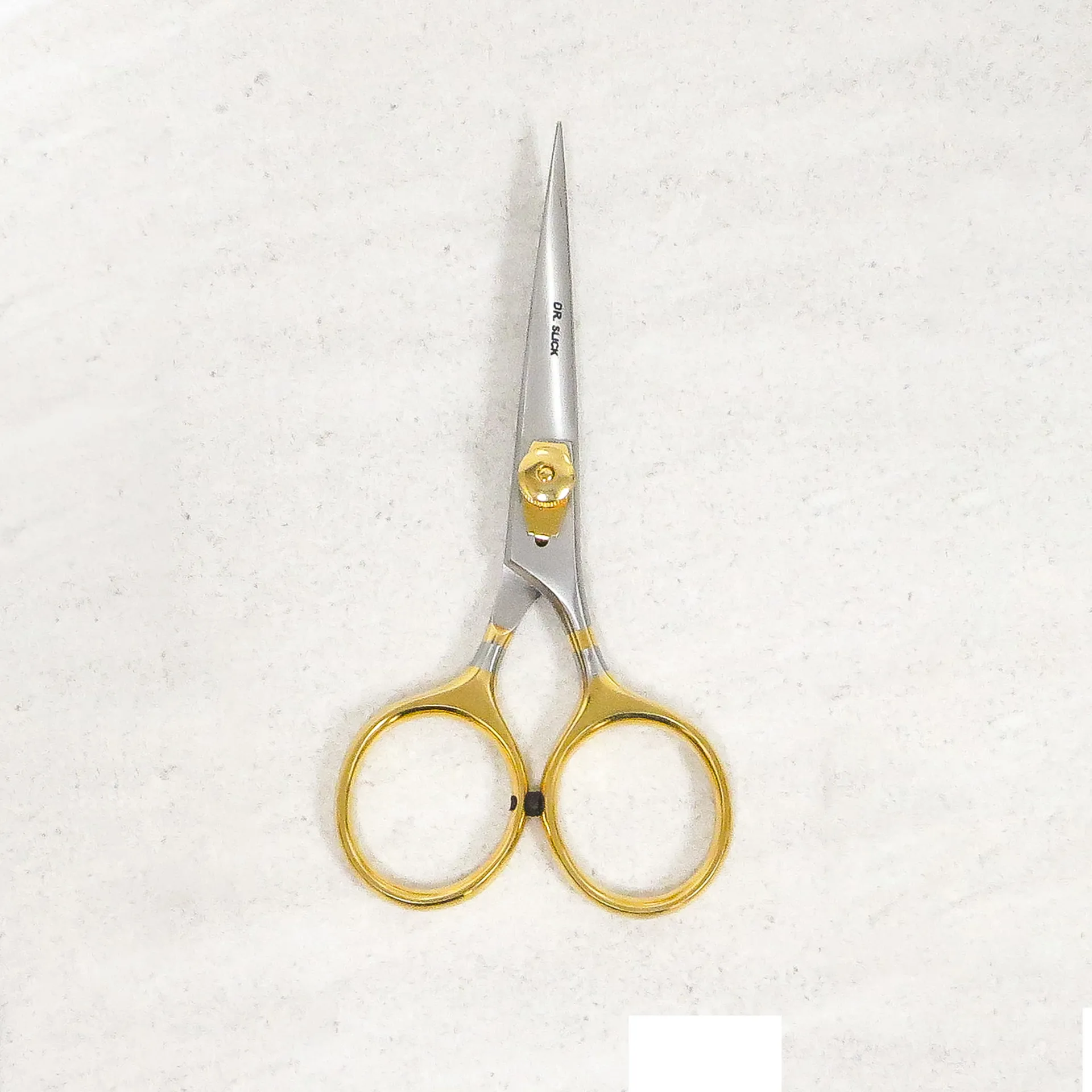 Dr.Slick Razor Scissors with adjustable serrated blades.